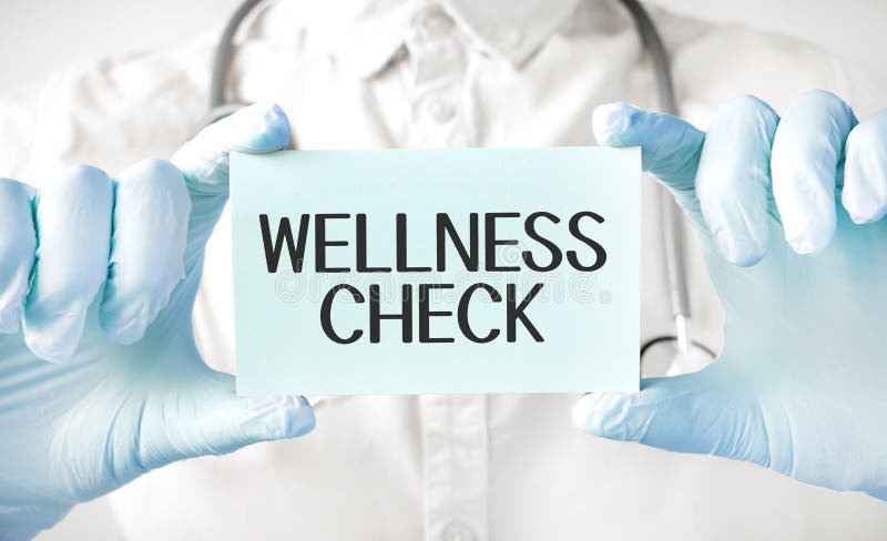 Doctor Holding Card in Hands and Pointing the Word WELLNESS CHECK Stock ...