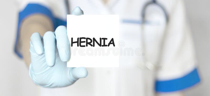 Doctor Holding a Card with Text HERNIA, Medical Concept Stock Photo ...