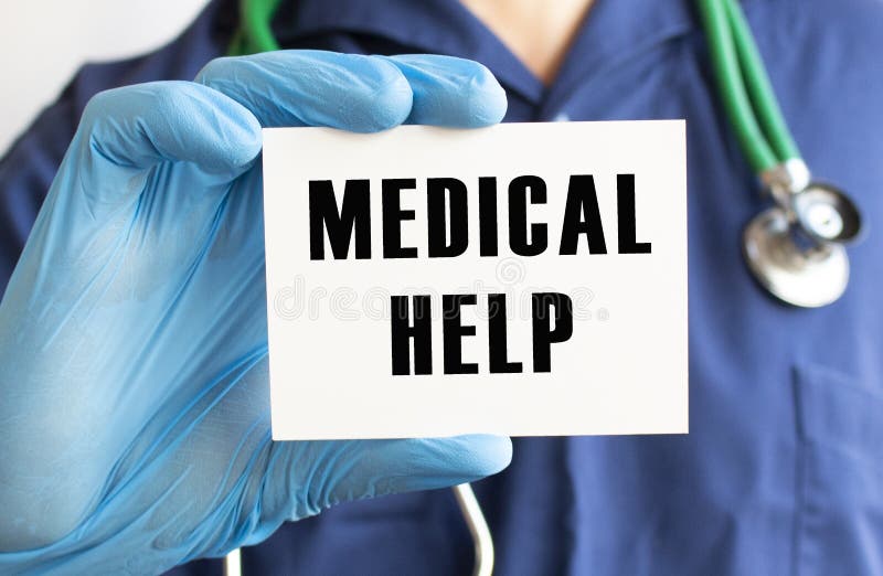 Doctor Holding a Card with Text MEDICAL HELP. Medical Concept Stock ...