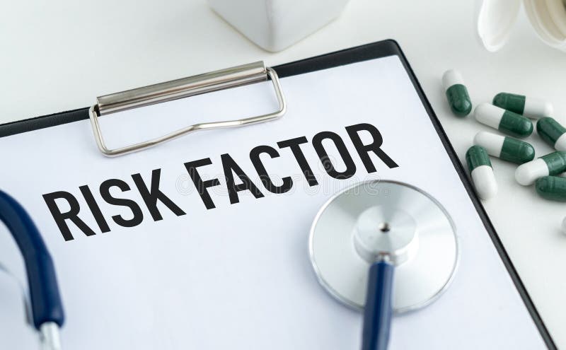 Doctor Holding a Card with Text RISK FACTOR, Medical Concept. Stock ...