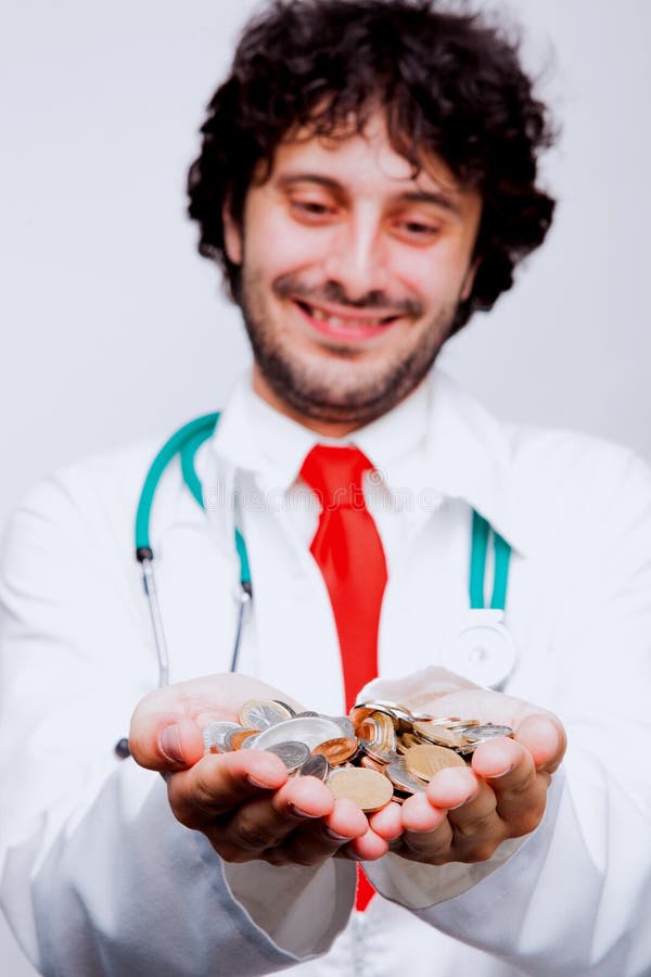 Doctor Holding Coins in His Hands and Smiling Stock Image - Image of ...