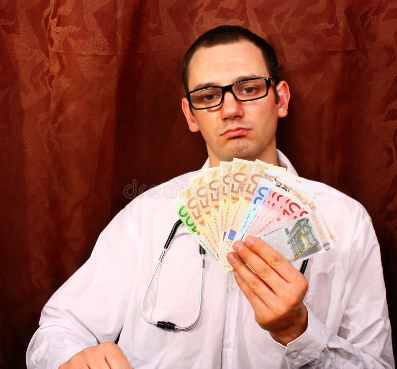 3,349 Doctor Holding Money Stock Photos - Free & Royalty-Free Stock ...