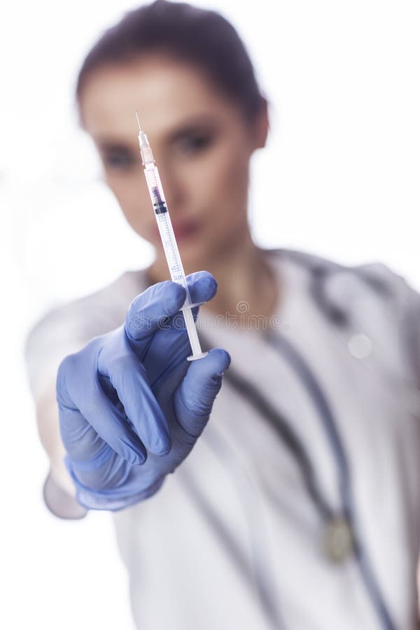 Doctor is Holding Injection with Needle with Focus on Injection. Stock ...