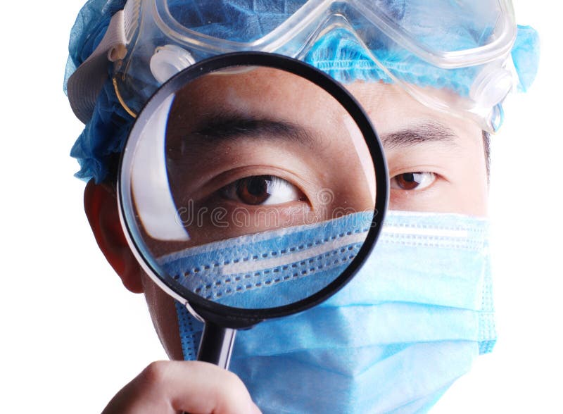 A Doctor with a Magnifier and a Gynecology Structure System Stock Photo ...