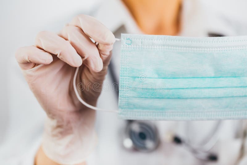 Doctor Holding Medical Face Mask in Hands Stock Photo - Image of ...