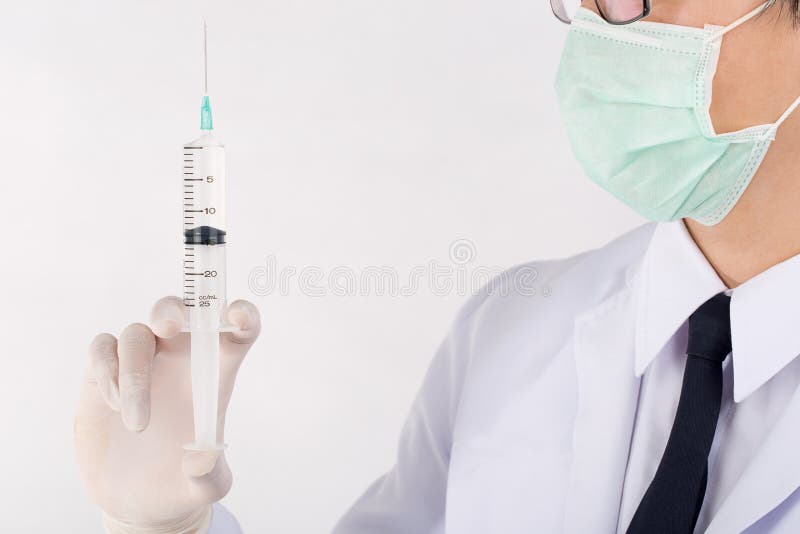 Doctor Holding Medical Injection Syringe With Saline Solution. Stock ...