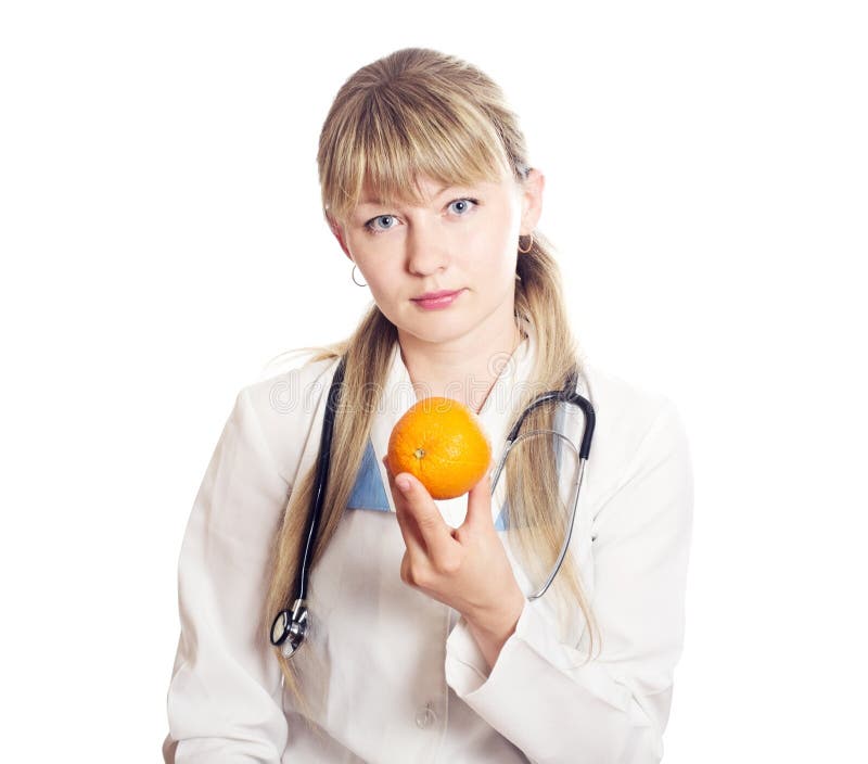 Doctor holding an orange stock image. Image of uniform - 24740293