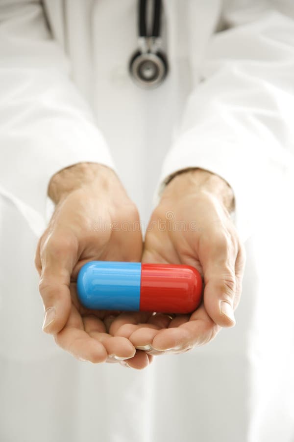 Doctor Holding Oversized Pill Stock Image - Image of pharmaceutical ...