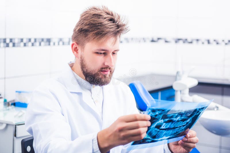 Doctor Holding X-ray Snapshot Stock Image - Image of cancer ...