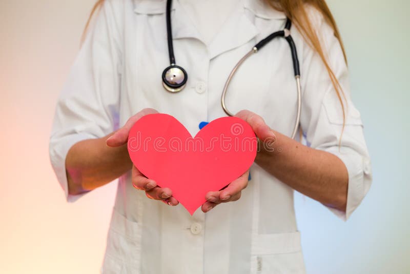 Doctor Holding Red Heart Cardiologist With Heart Shape In Hands Close