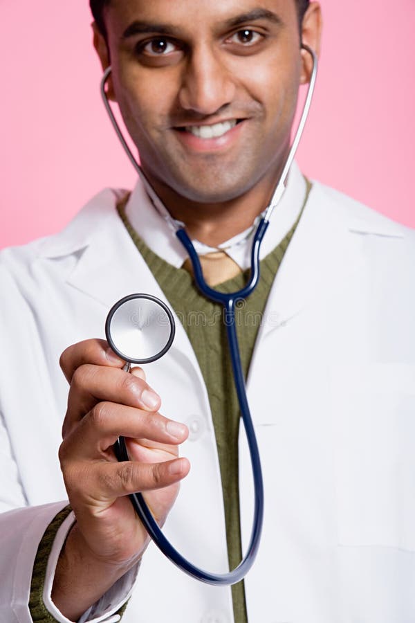 Doctor Holding a Stethoscope Stock Photo - Image of camera, asian: 62561416