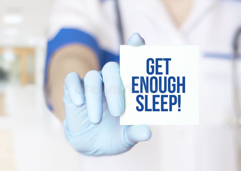 The Doctor is Holding a Sticker and Text Get Enough Sleep. a Medical ...