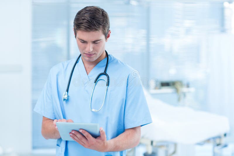 Doctor holding tablet stock image. Image of caring, paramedic - 54763011