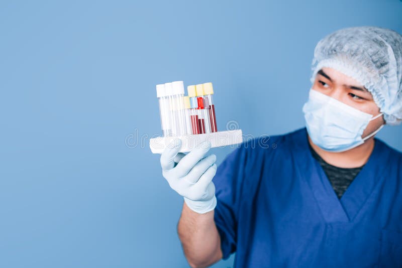 Doctor holding test tubes stock photo. Image of microbiology - 176004276