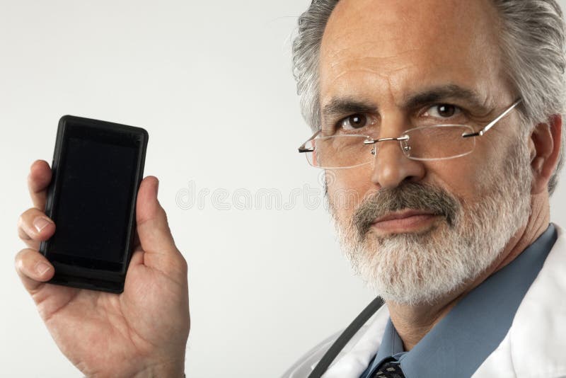 Doctor Holding Up Cell Phone Stock Image - Image of fifties, adult ...