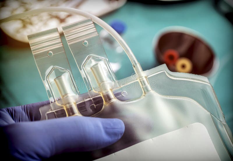 Doctor Holds Blood Sample at a Hospital Table Stock Photo - Image of ...