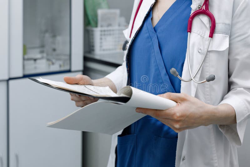 The Doctor Holds in His Hands the Results of the Analysis of the ...