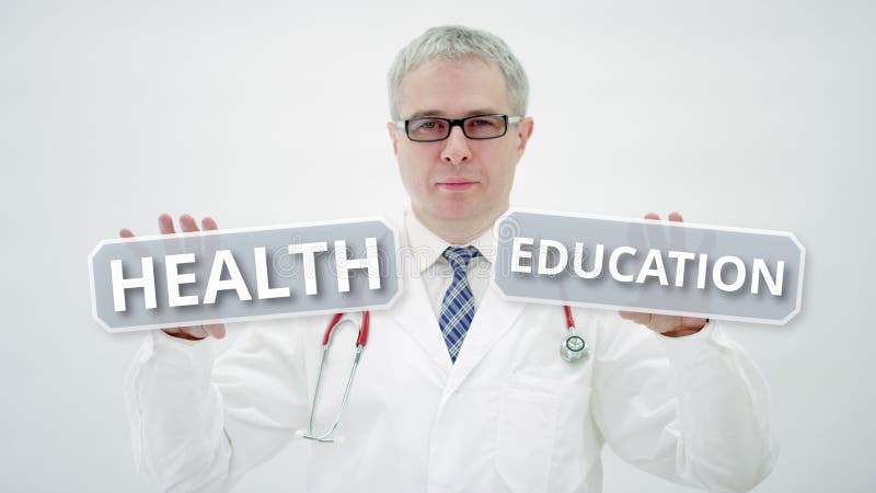 Doctor Holds HEALTH EDUCATION Words in His Hands Stock Image - Image of ...