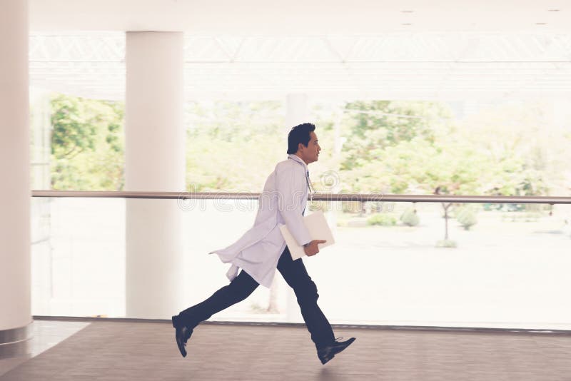 Doctor in a hurry stock image. Image of document, professional - 52276851