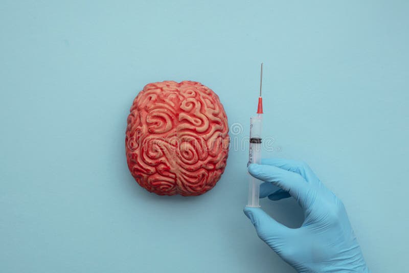 Doctor Injecting a Brain with a Syringe. Mental Illness Concept Stock ...