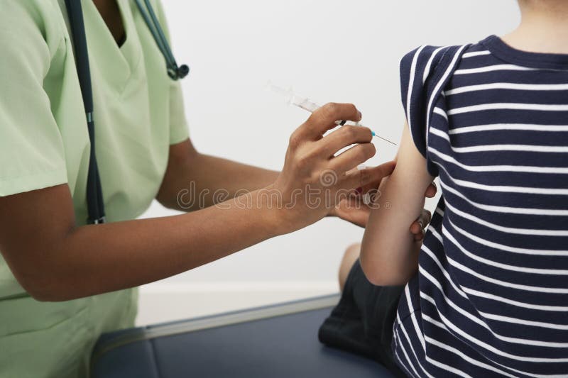 Doctor Injecting Syringe on Boy S Arm Stock Image - Image of clinic ...