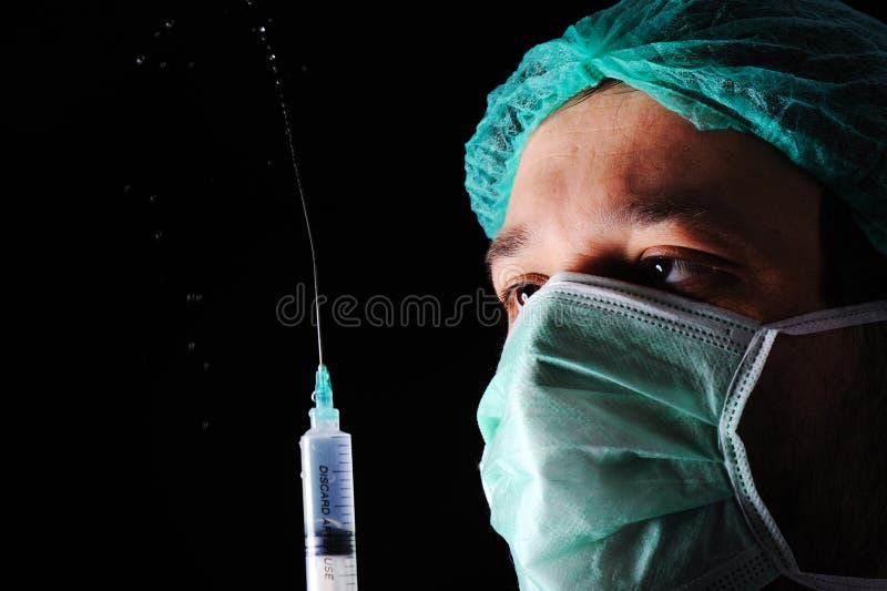 Doctor with a Big Injection Stock Photo - Image of needle, dance: 47871868
