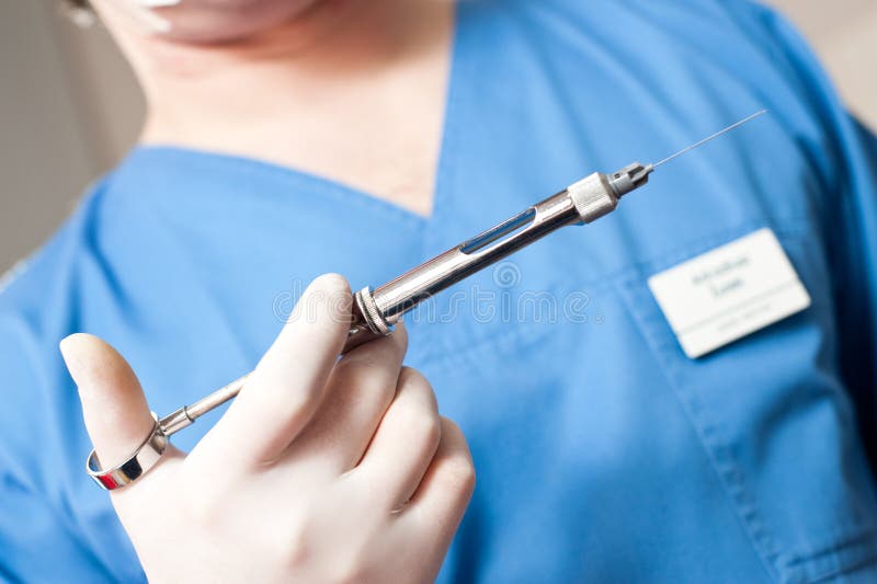 Doctor with injection stock image. Image of medical, protective - 19357875