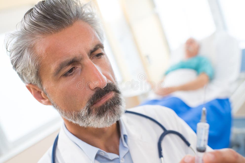 Doctor with Injection Needle Stock Image - Image of protection ...