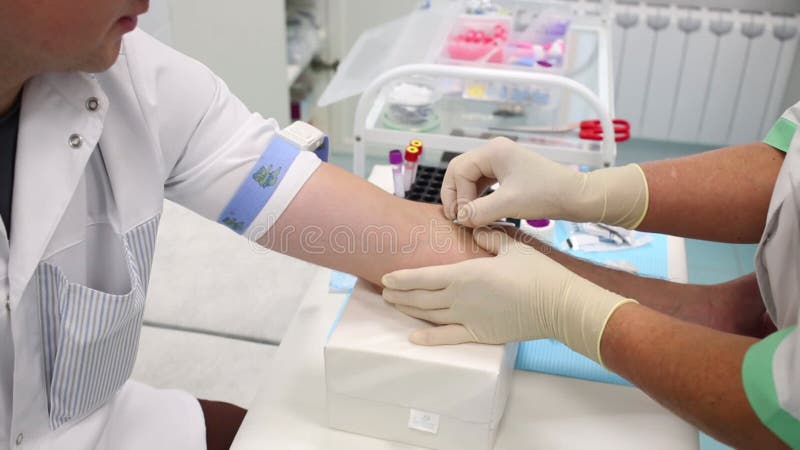 Doctor Inspect Needle To Mans Vein at the Stock Footage - Video of blur ...