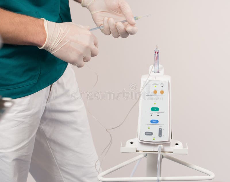 Doctor with Intravenous Pump Machine Stock Photo - Image of anesthetic ...
