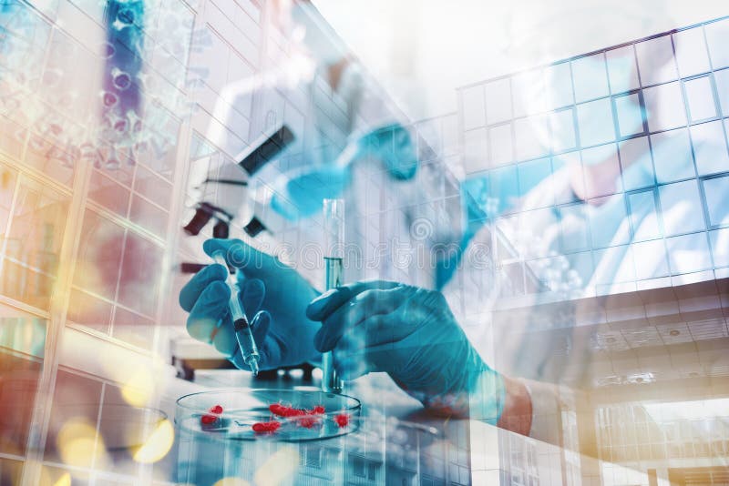 Doctor in the Laboratory Analyzes Samples of Codiv-9 Under a Microscope ...