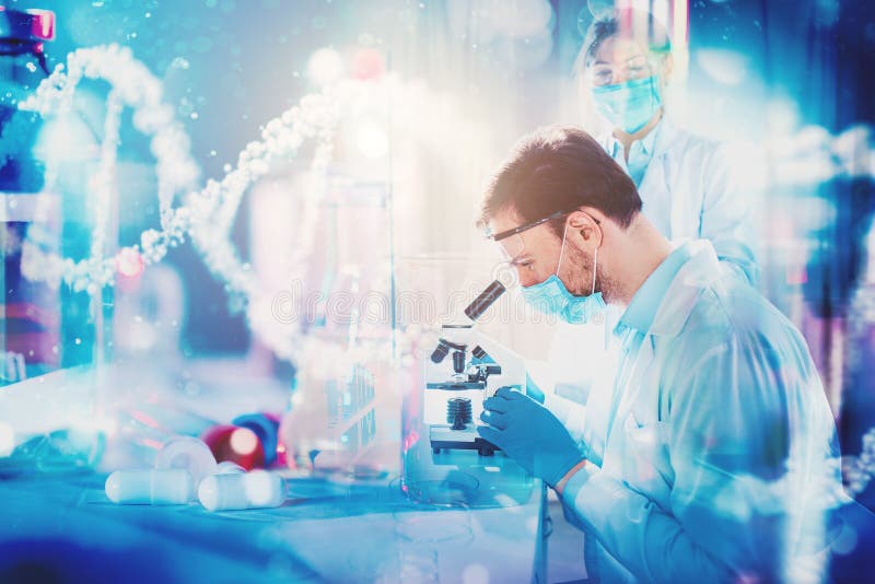 Doctor in the Laboratory Analyzes Samples of Codiv-9 Under a Microscope ...