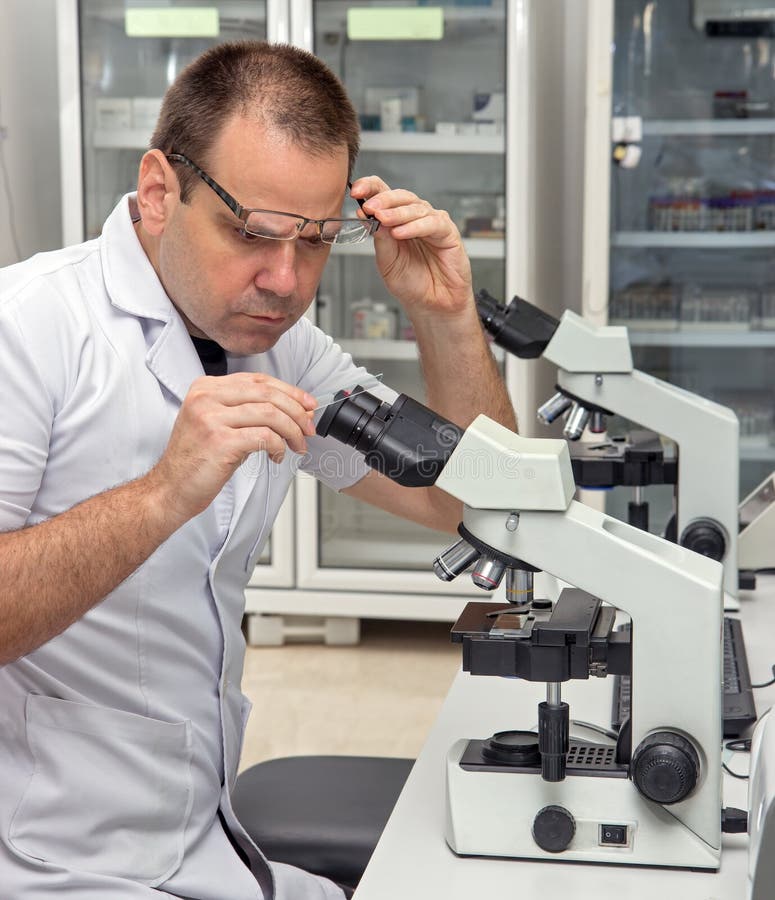 Doctor in laboratory stock photo. Image of discover, lens - 51840128