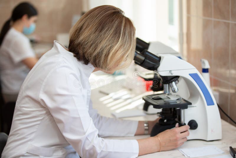 Doctor Laboratory Worker Examines the Material Stock Photo - Image of education, oncology: 300272974
