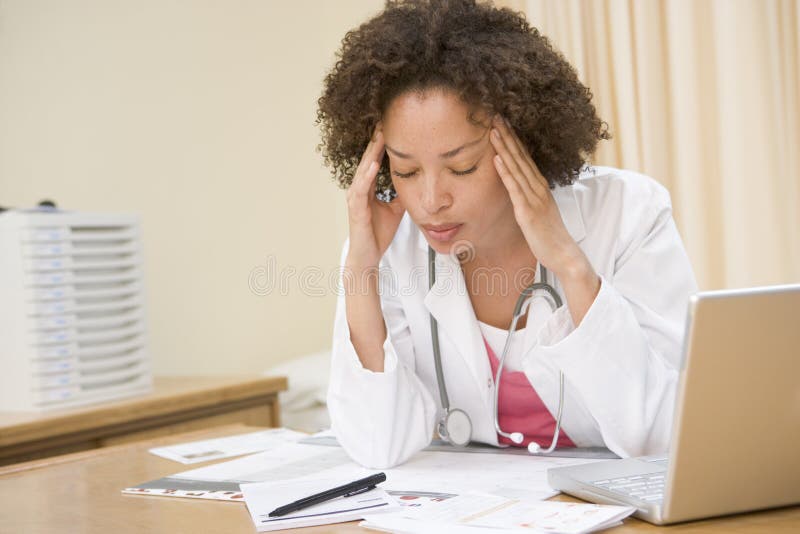 Overworked Tired Doctor at Computer Stock Image - Image of ethnic ...