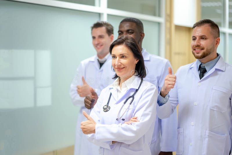 Doctor Leading Team of the Medical Center Stock Photo - Image of smile ...