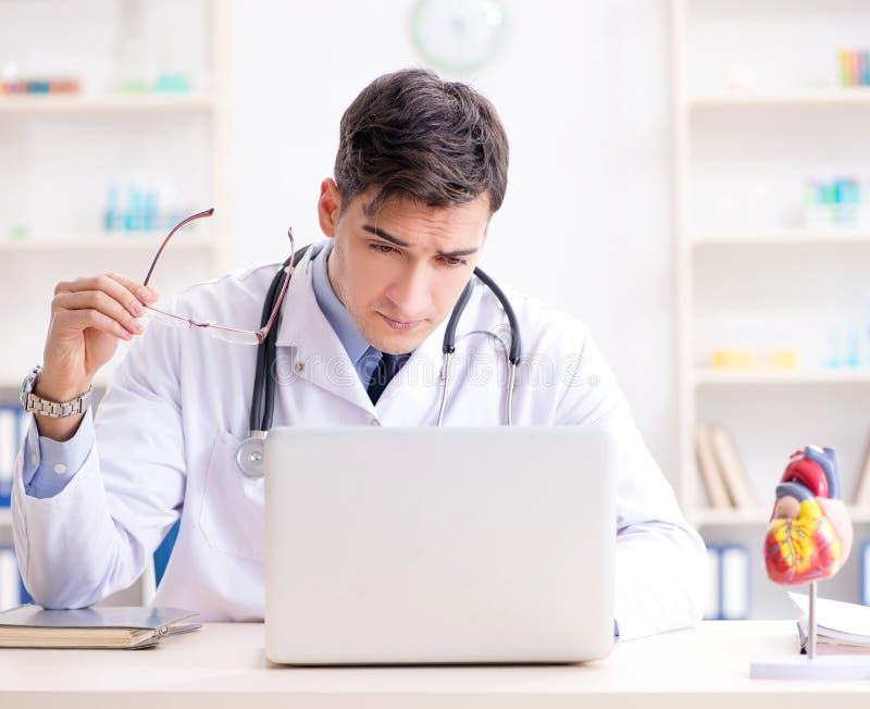 Doctor Lecturer Explaining the Heart Model Stock Photo - Image of ...