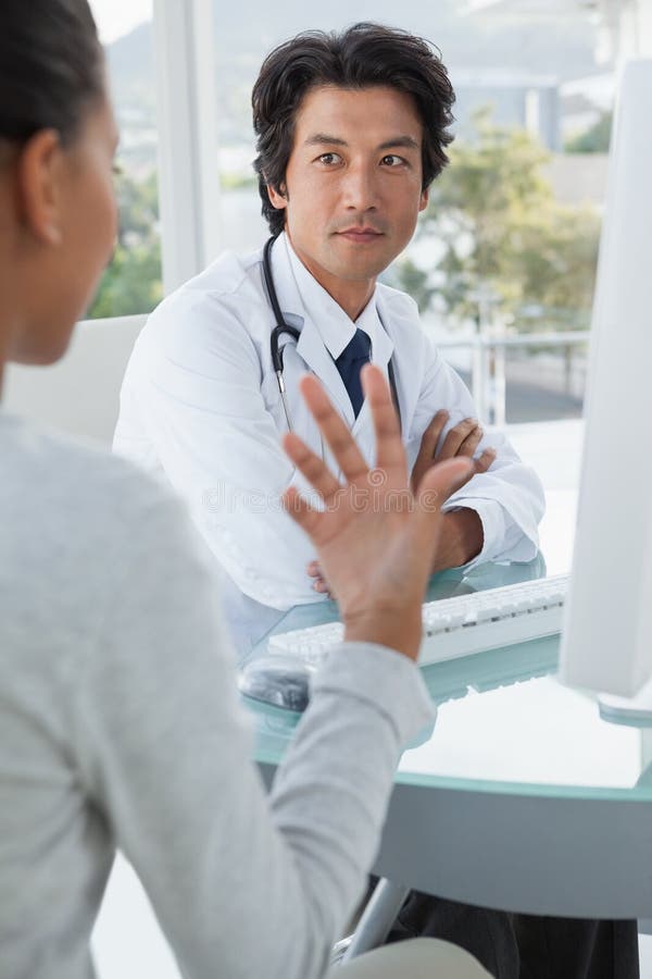 Doctor Listening To His Patient Stock Image - Image of indoors, health ...
