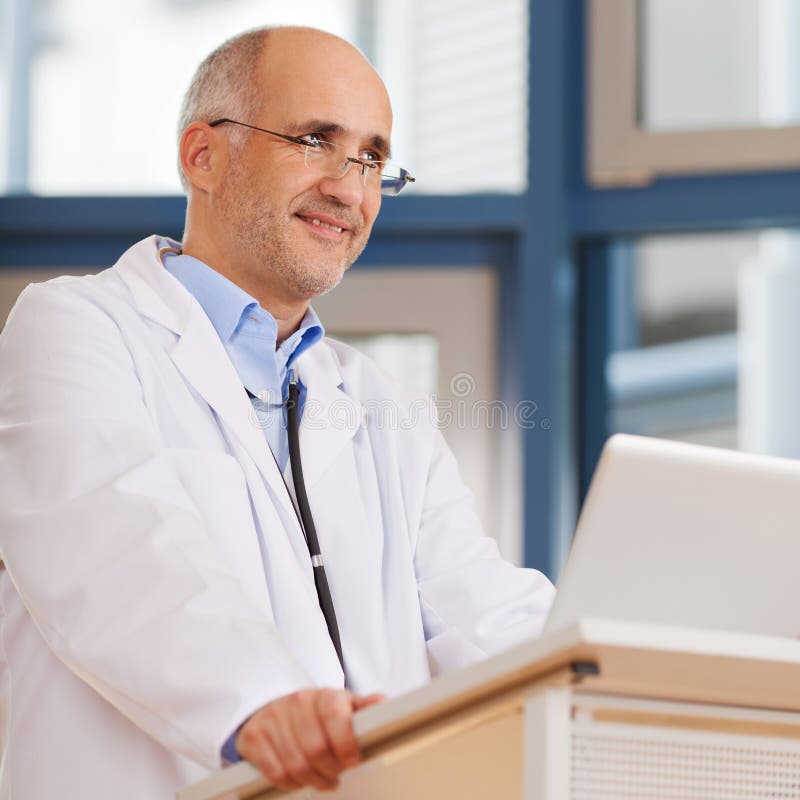 Doctor Looking Away at Podium Stock Image - Image of focus, leadership ...