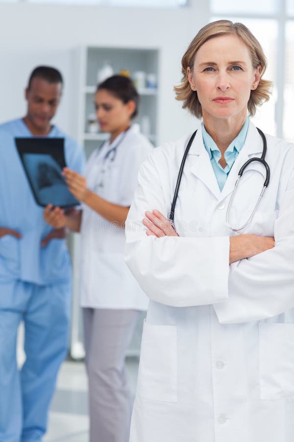 Doctor Looking at the Camera Stock Photo - Image of portrait, happy ...