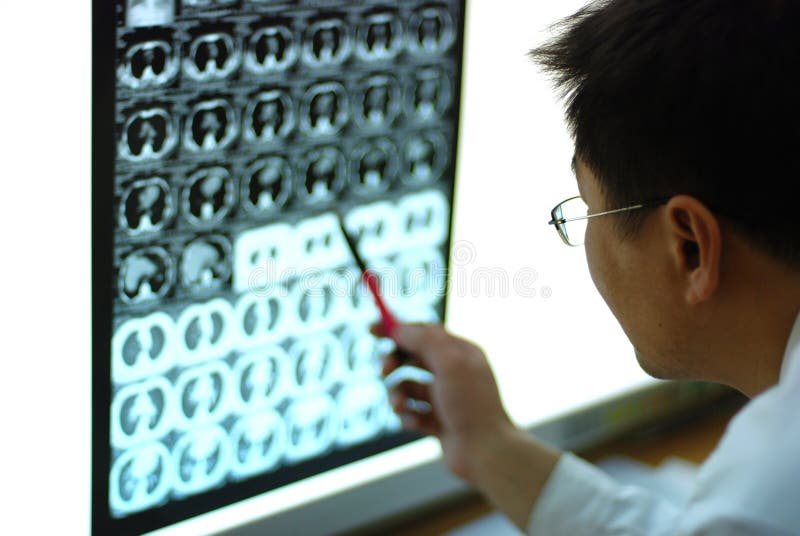 Doctor looking at analysis stock photo. Image of illness - 12551954