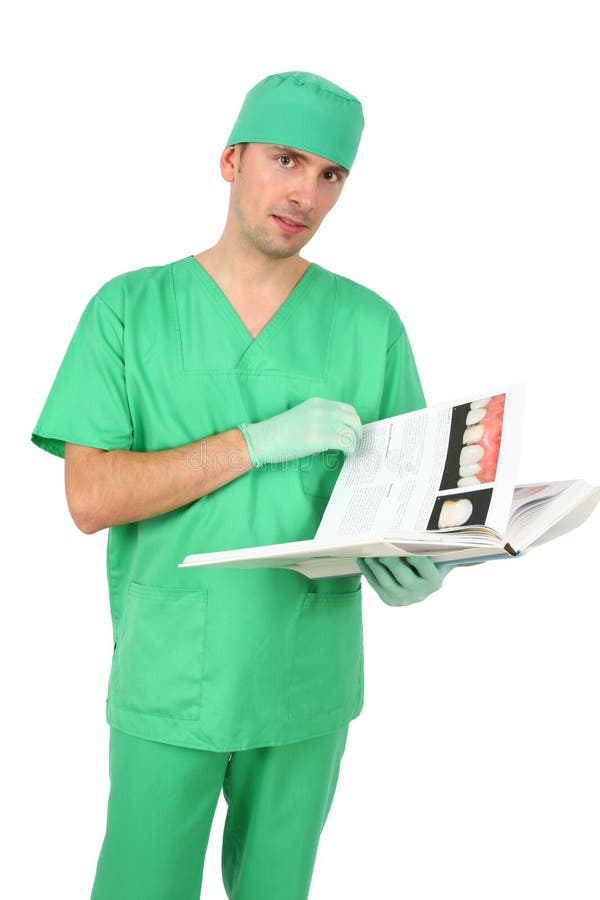 Doctor Looking at Medical Book Stock Image - Image of doctor, dentist ...
