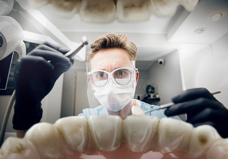 Doctor Looking into the Mouth, Checking, Examining Teeth Stock Photo ...