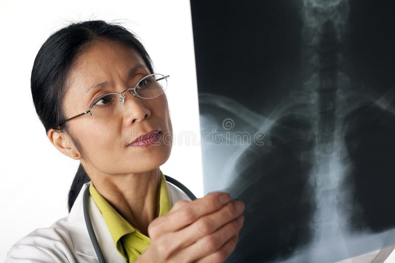 Doctor Looking at X-Ray stock photo. Image of close, medicine - 13192626