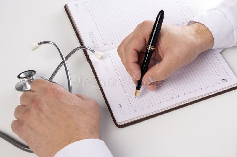 The Doctor Makes an Entry in the Diary. Stock Image - Image of hospital ...