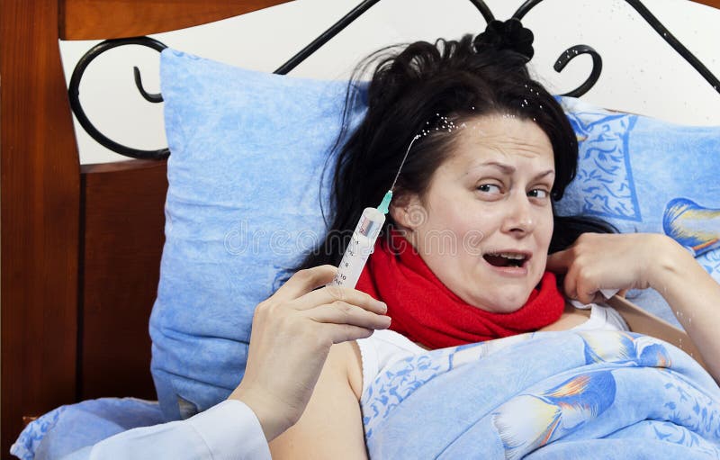 Doctor makes a shot girl stock photo. Image of health - 23590274