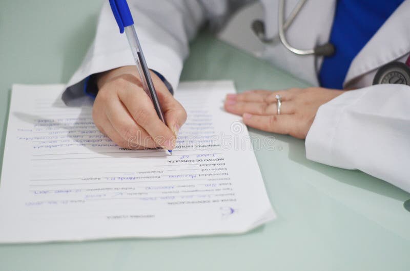 Doctor Making a Note for His Patient Stock Image - Image of finger ...