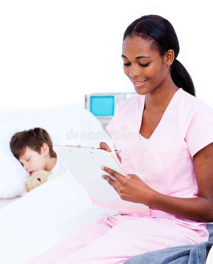 Doctor Making Notes on a Patient S Clipboard Stock Photo - Image of ...