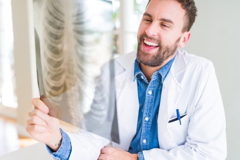 Doctor Man Looking at X-ray Radiography Doing Body Examination Stock ...