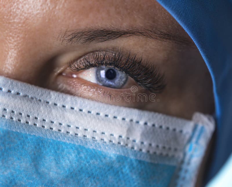 Doctor in Mask Looks at Camera. Close Up Stock Photo - Image of ...